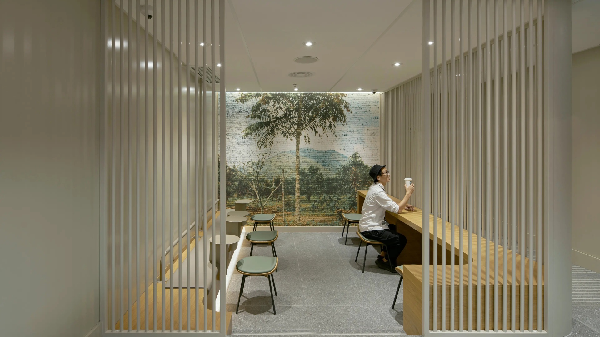 Signage and ESL: Sustainable Starbucks Stores | invidis