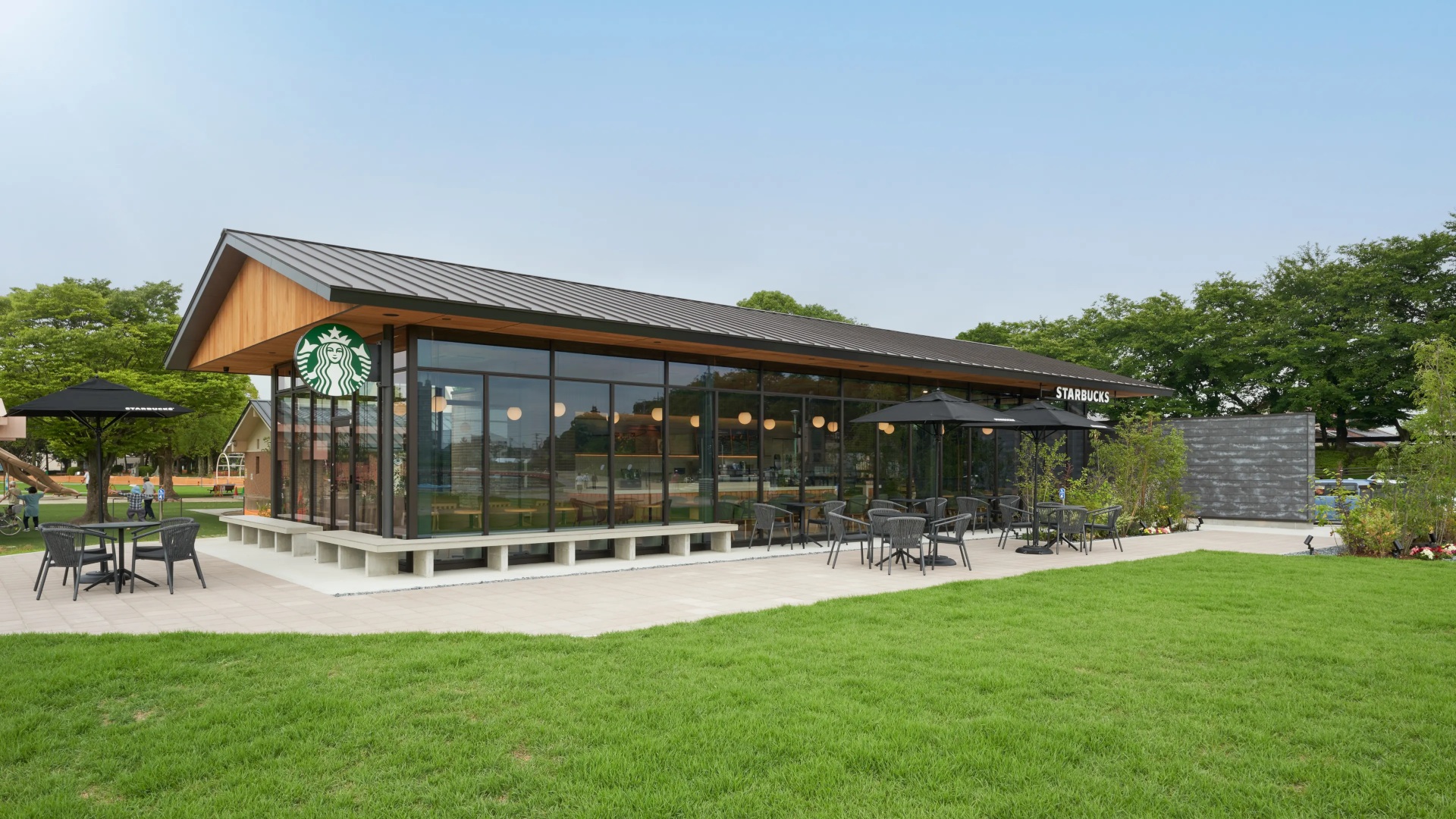 Signage and ESL: Sustainable Starbucks Stores | invidis